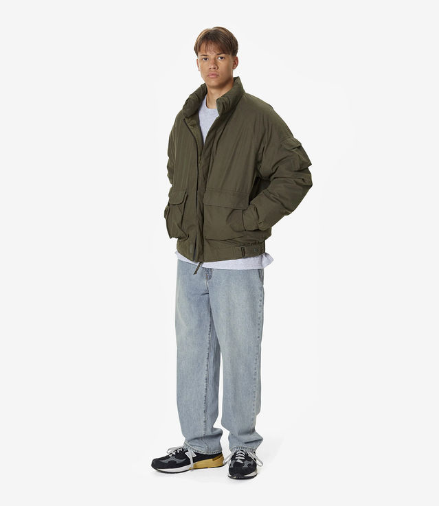 Shop Thisisneverthat Multi Pocket Down Jacket Olive Brown at Shop Thisisneverthat Multi Pocket Down Jacket Olive Brown at