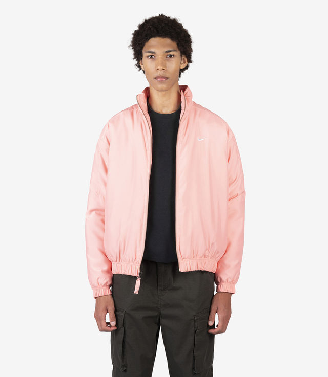 Shop NikeLab Solo Swoosh Satin Bomber Jacket Bleached Coral/White at ...
